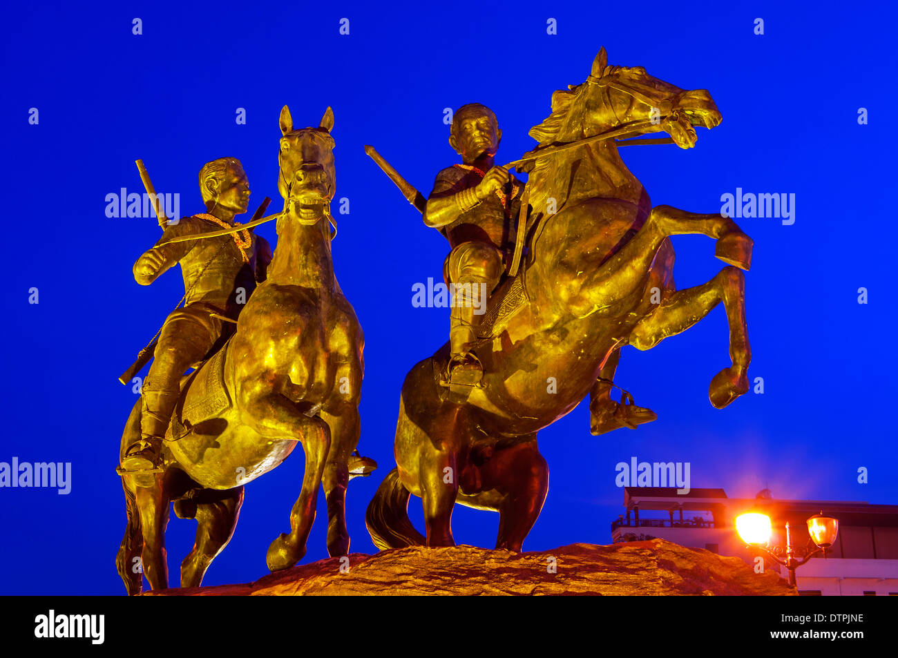 statue of Techo Meas and Techo Yot on Sisowath Quay Riverfront at dusk ...