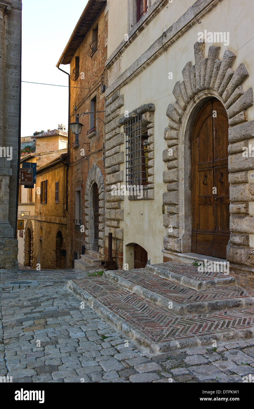 Brick and stone steps leading to the Palazzo Contucci in the Piazza ...