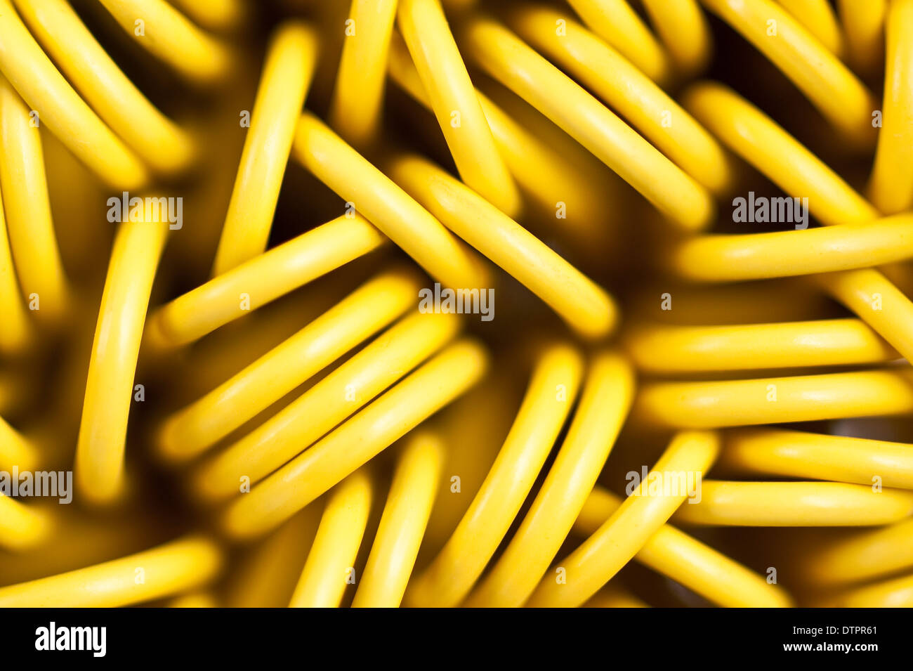 Container of yellow paper clips Stock Photo - Alamy