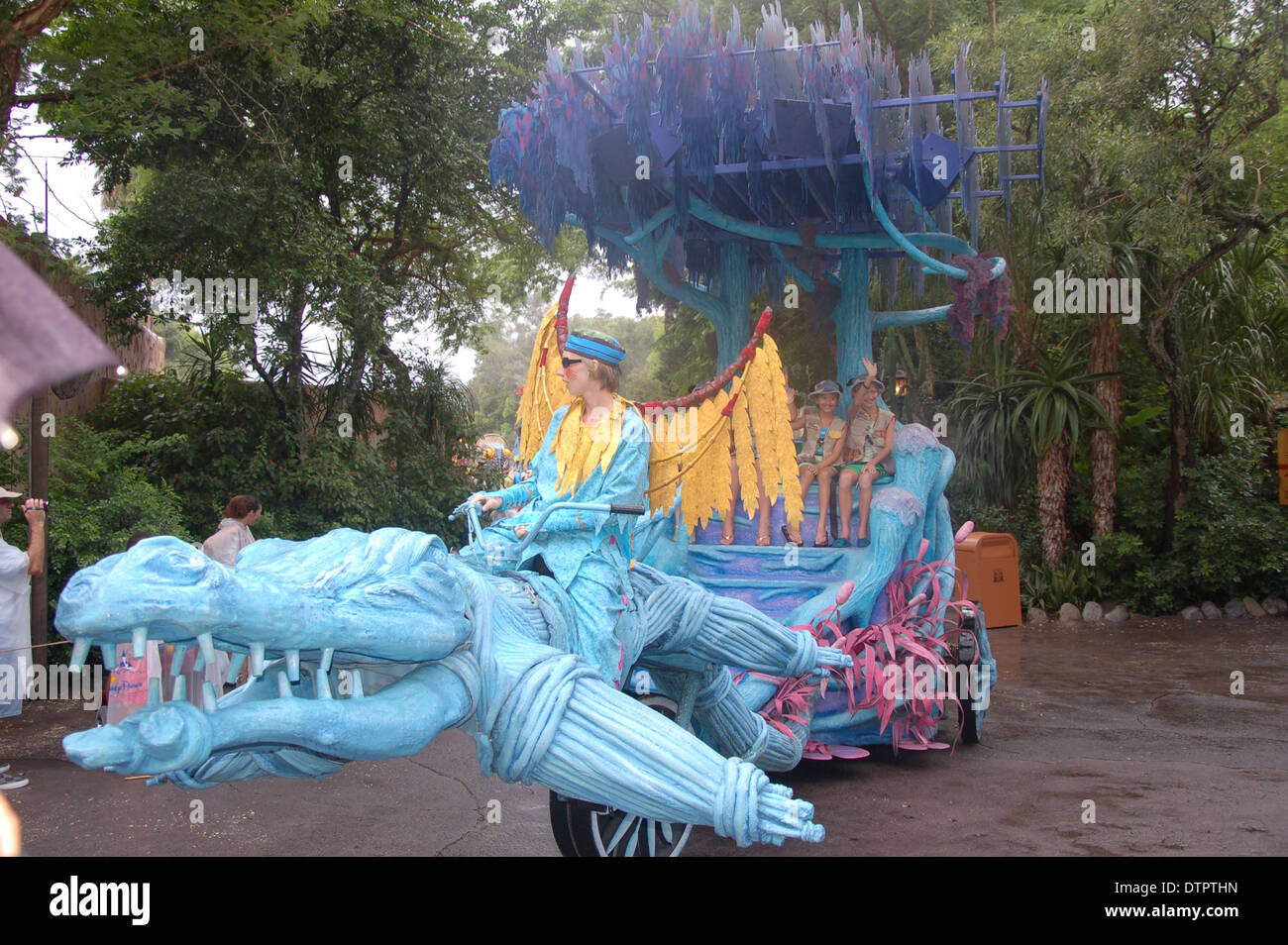 An Alligator looking float parading at Mickey's Jamming Jungle Parade ...