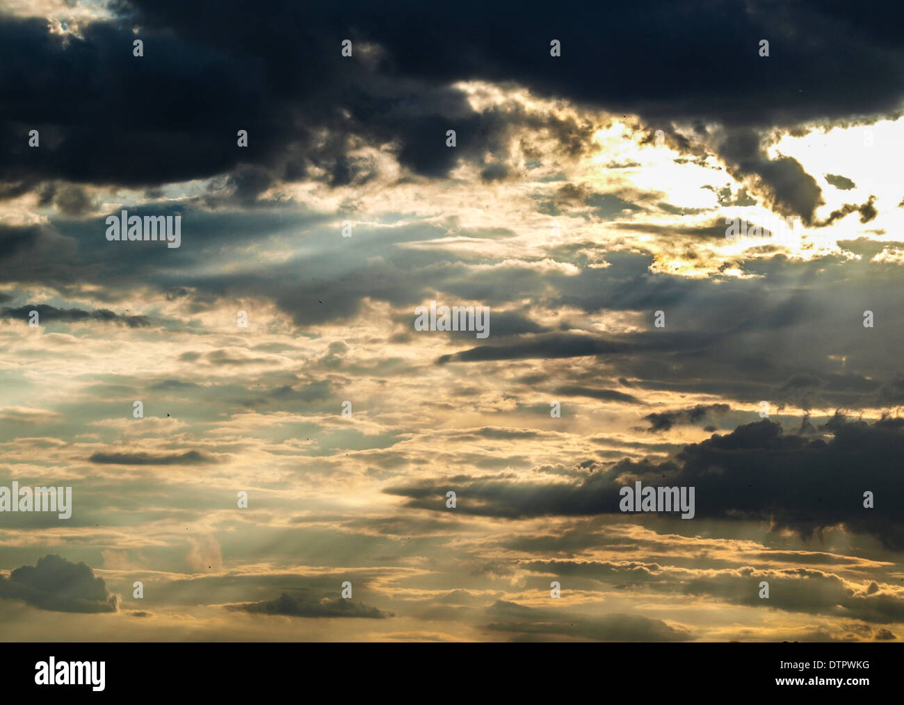 African sky with sunset light between the clouds Stock Photo - Alamy