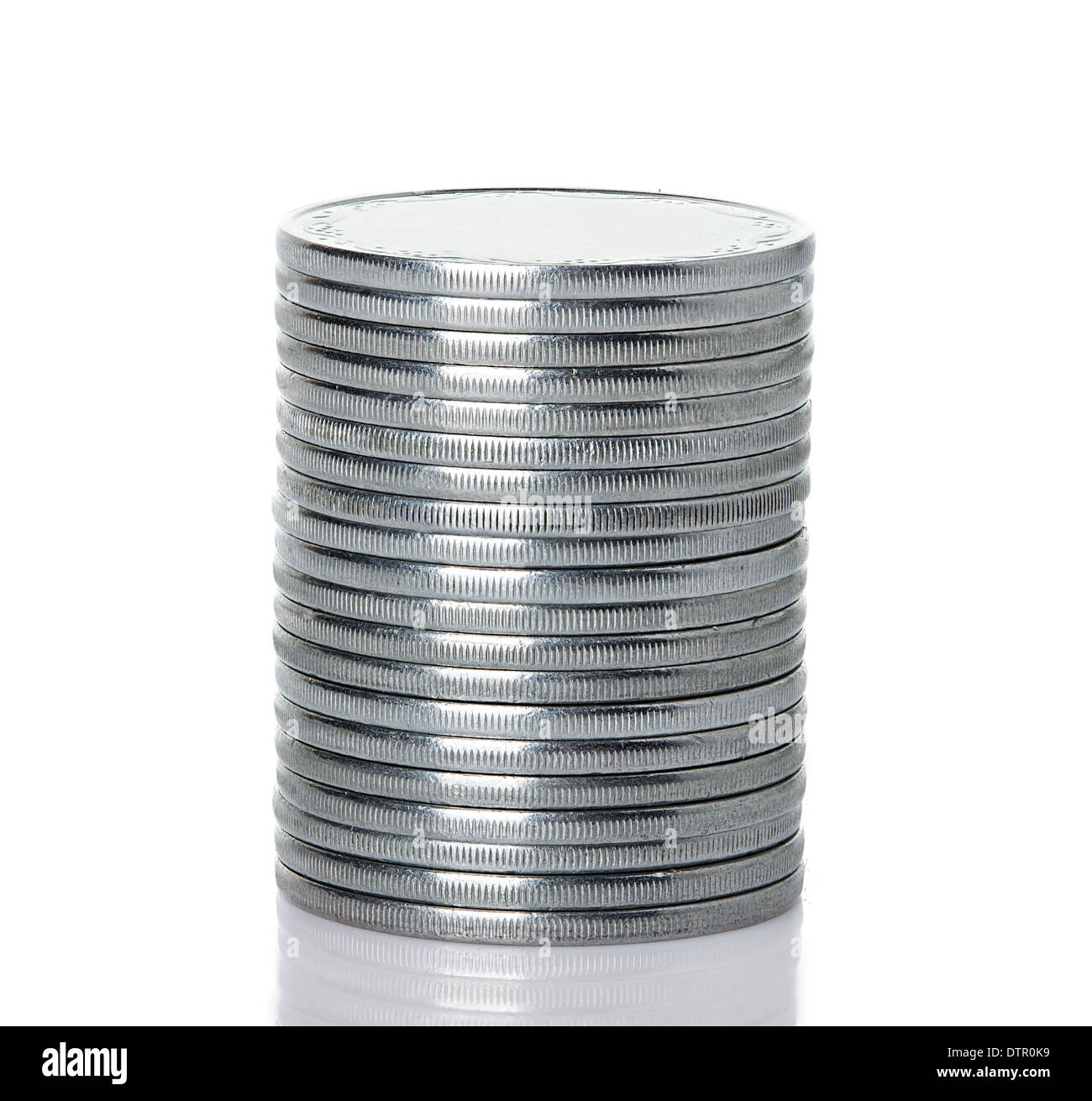 A stack of silver coins, isolated on white Stock Photo - Alamy