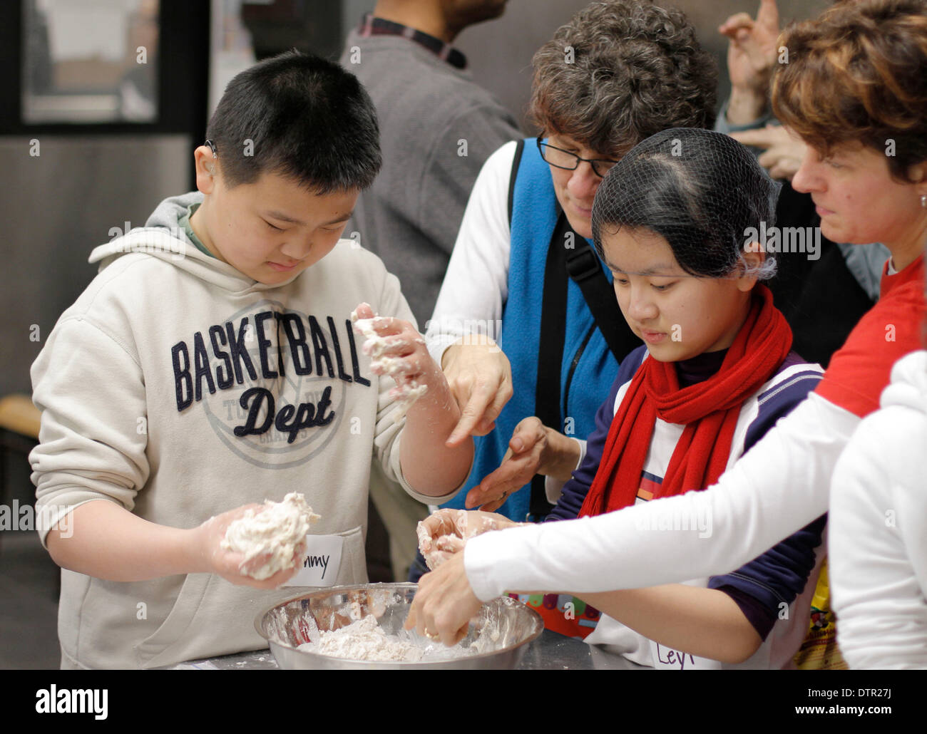 Vancouver, Canada. 22nd Feb, 2014. Deaf children learn how to make ...