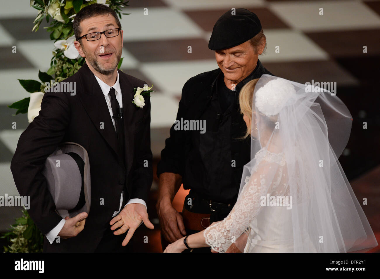 Sanremo, Italy. 22nd Feb, 2014. Fabio Fazio, Don Matteo and Luciana ...