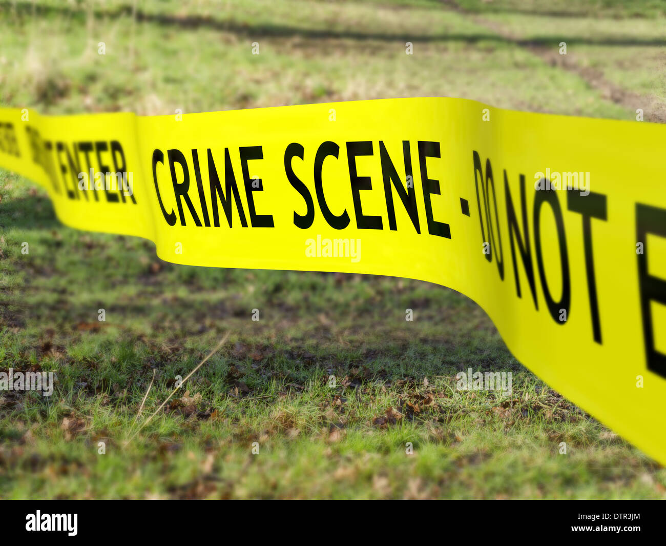 Crime scene tape being used to protect a criminal investigation Stock ...