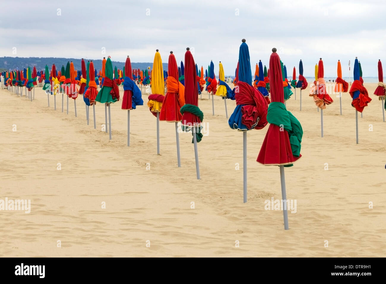 Colorful parasol on the Beach Stock Photo - Alamy