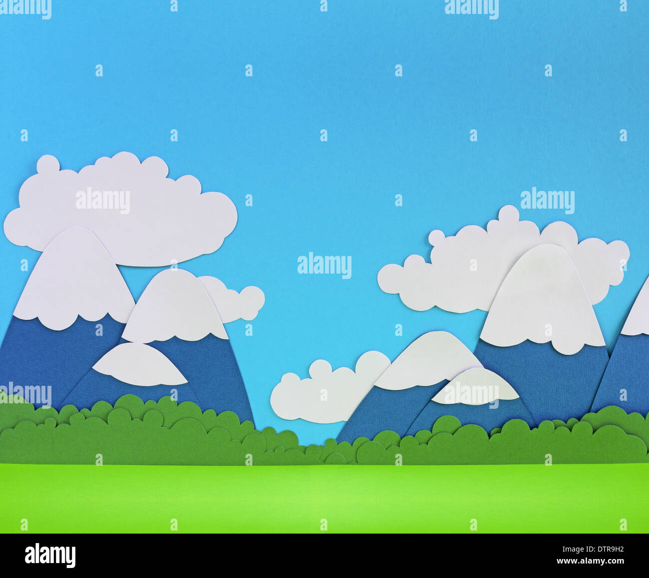 Paper landscape with mountains, trees, clouds and meadow Stock Photo ...