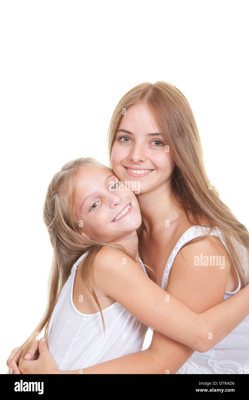 Siblings sisters hugging hi-res stock photography and images - Alamy
