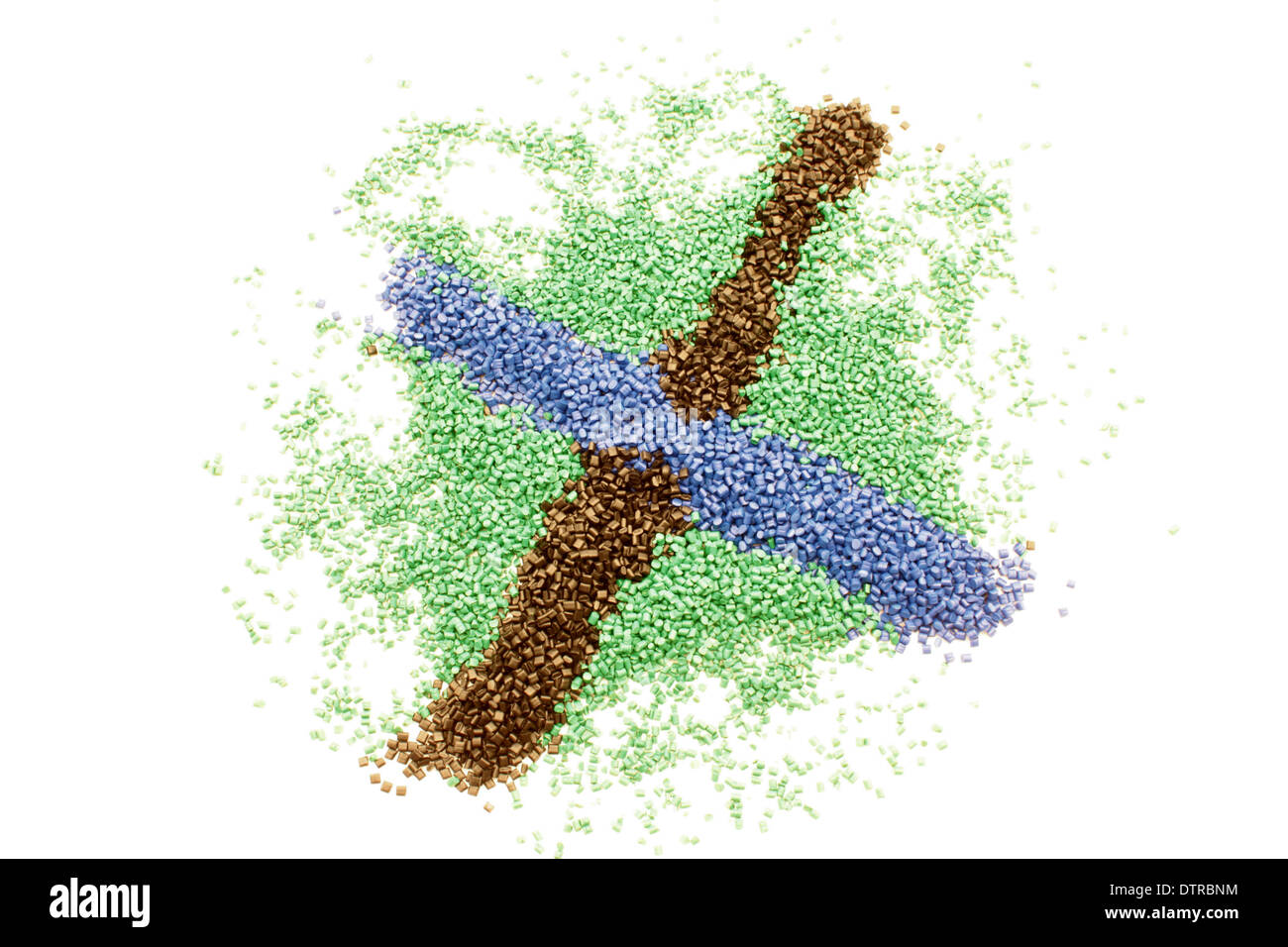 Colored plastic polymer granules in cross shape, white background Stock ...