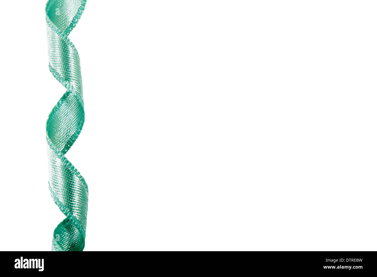 Shiny green satin ribbon on white background with copy space Stock ...