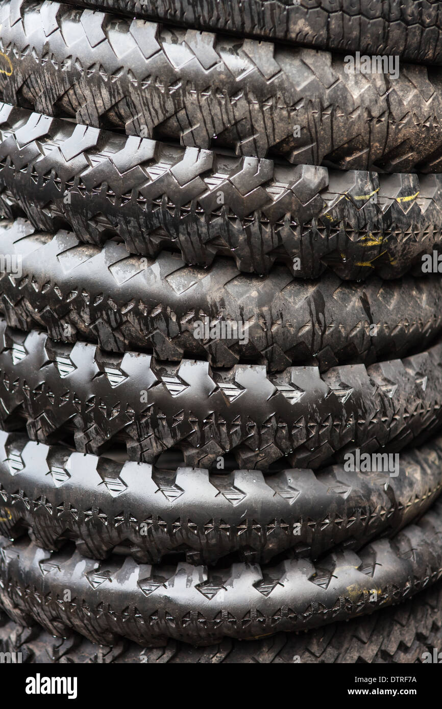 Stack of motorcycle tyres in a distribution centre Stock Photo - Alamy
