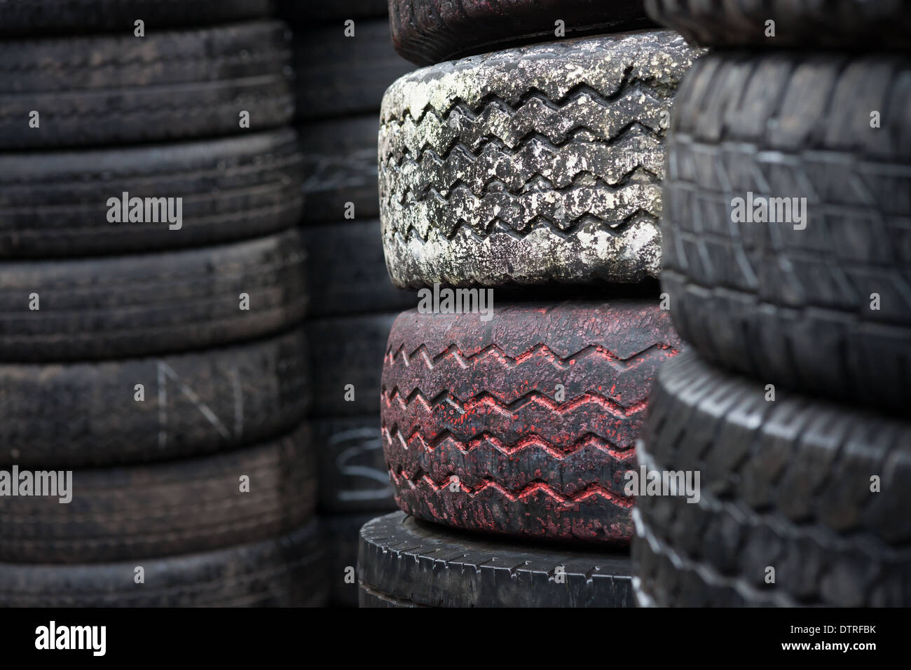 Stack of car tyres in a distribution centre Stock Photo - Alamy