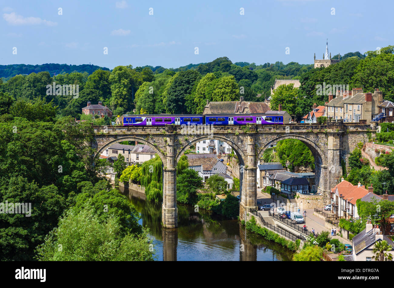 Northern Rail train on the viaduct over the River Nidd, viewed from the ...