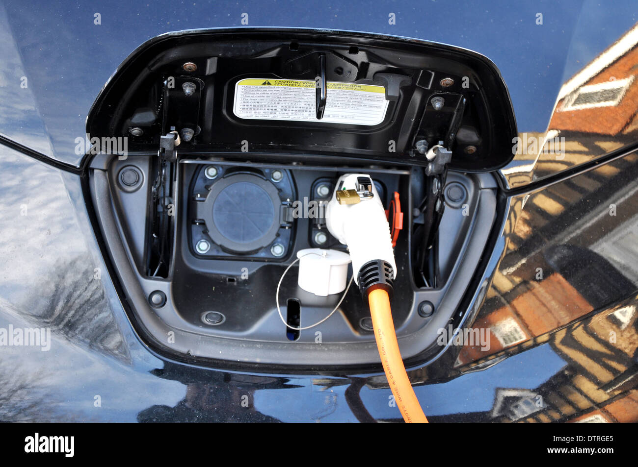 Charging point on a electric car Stock Photo - Alamy