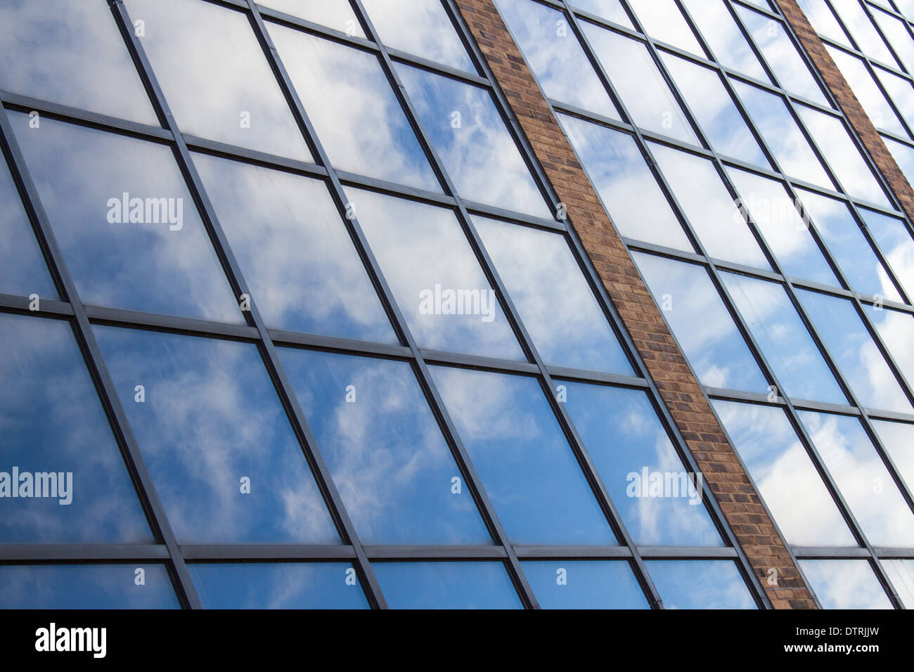 sky reflecting in windows Stock Photo - Alamy