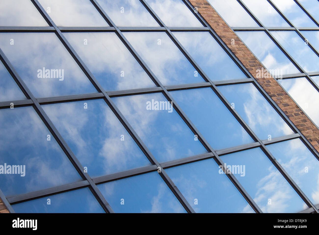 sky reflecting in windows Stock Photo - Alamy