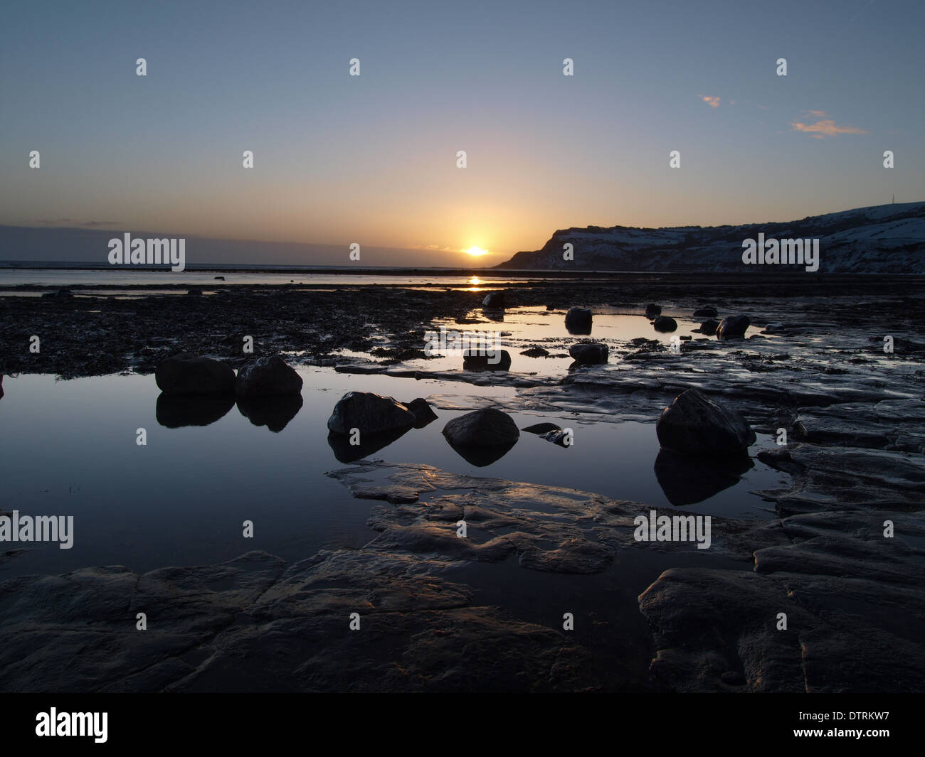Sunrise at Boggle Hole, Robin Hood's Bay Stock Photo - Alamy