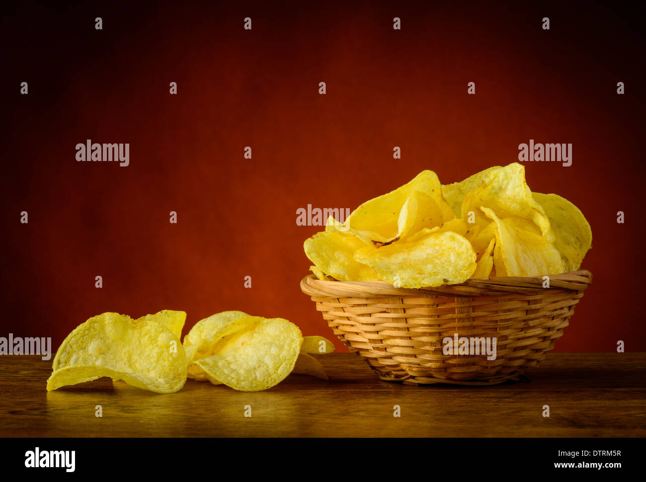 still life with traditional homemade potato chips snacks Stock Photo ...