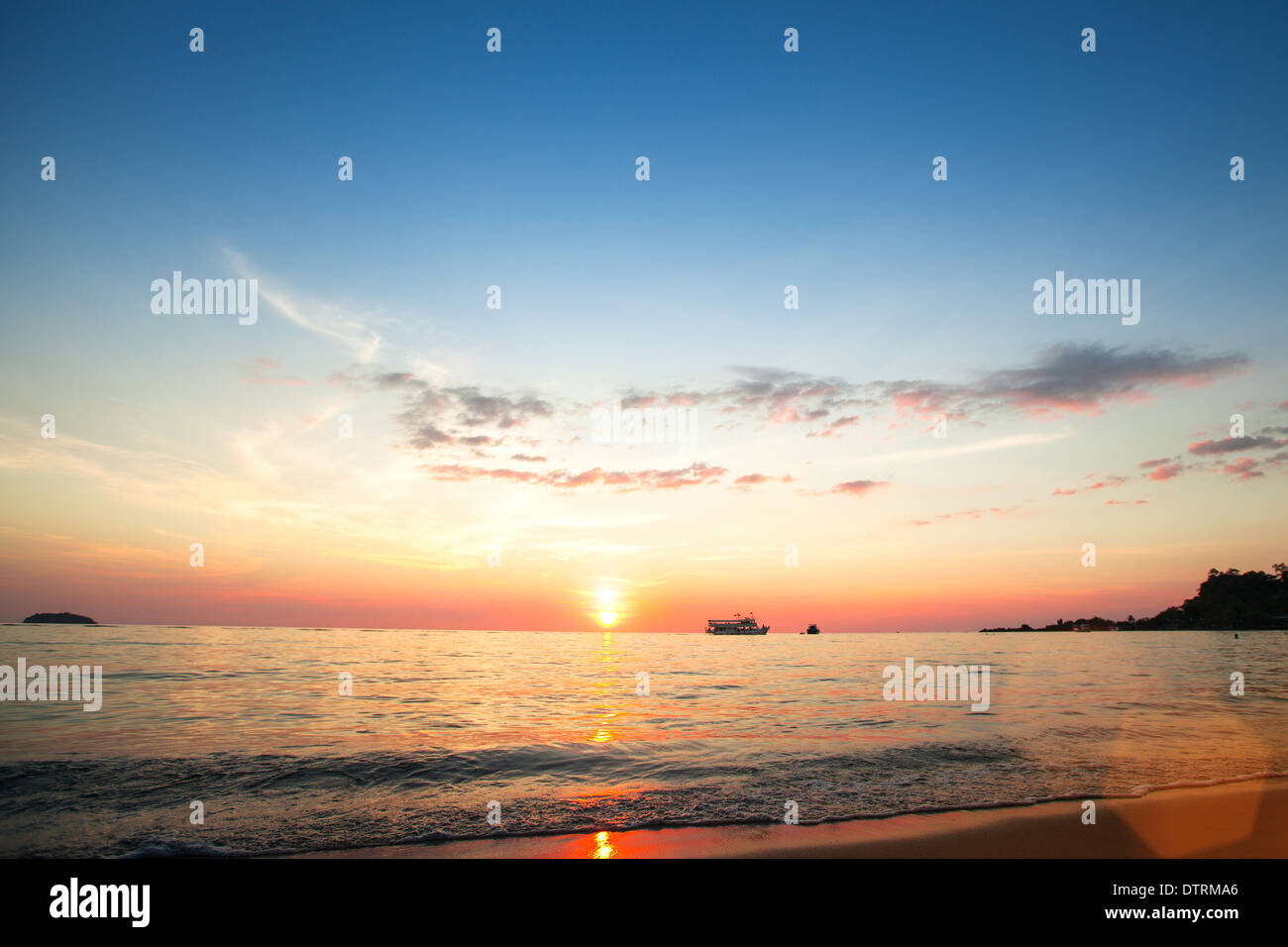 Beautiful sunset of sea beach Stock Photo - Alamy