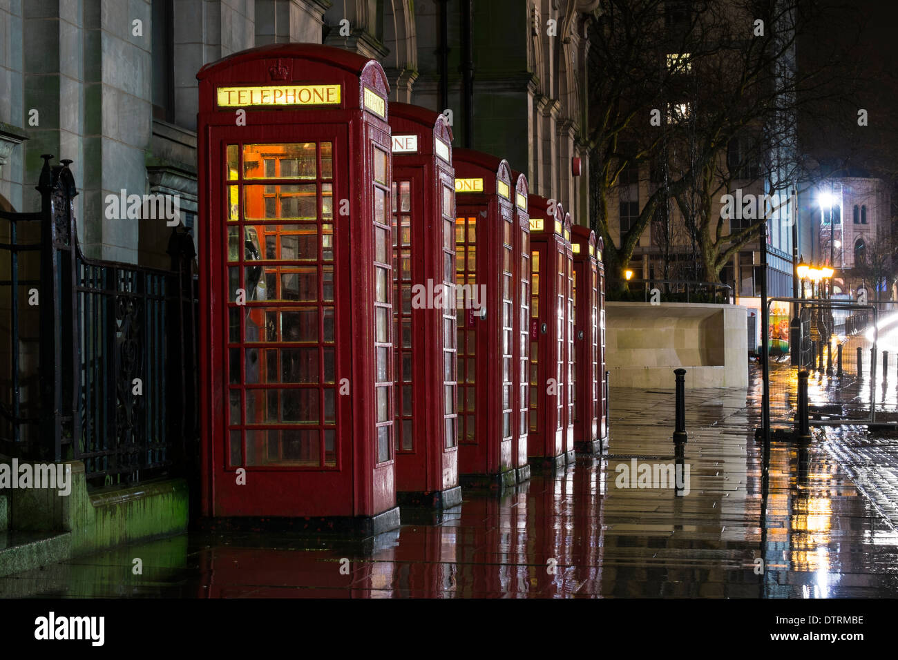 Row of Red Telephone Boxes Stock Photo - Alamy