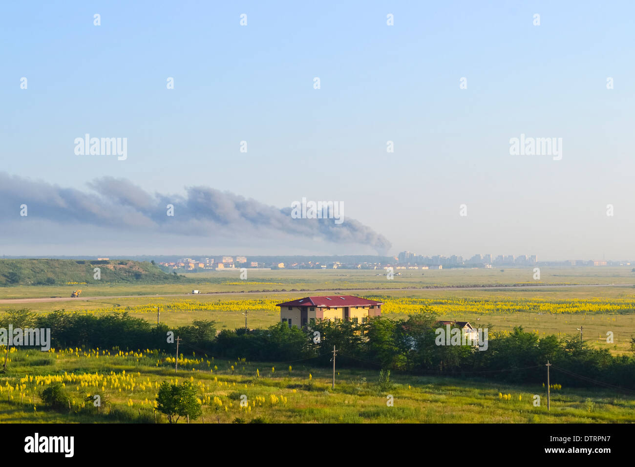 Smoke over a residential area Stock Photo - Alamy