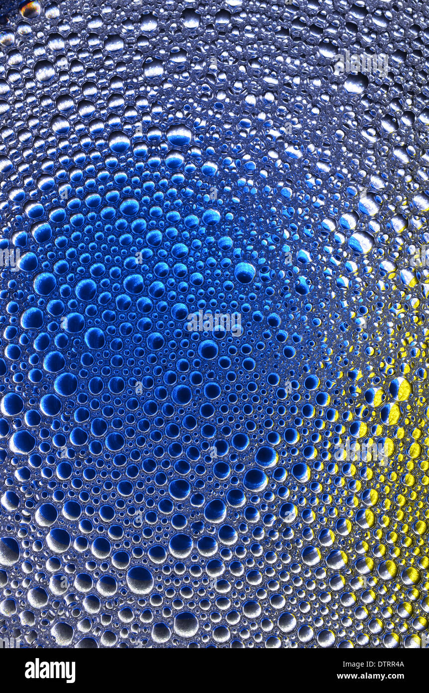 Soapy bubbles with coloured filters in the water Stock Photo - Alamy
