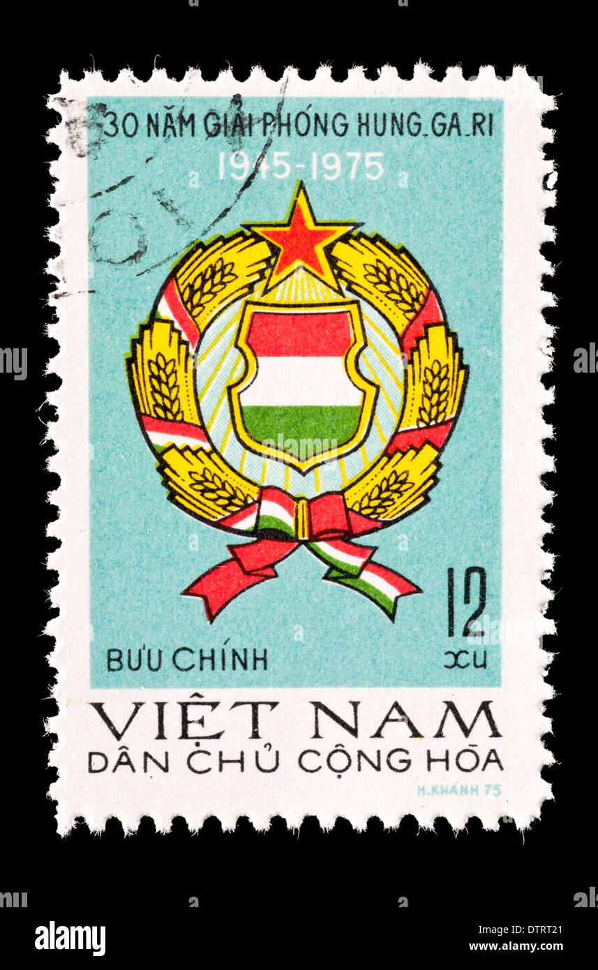 Postage stamp from North Vietnam depicting the national coat of arms ...