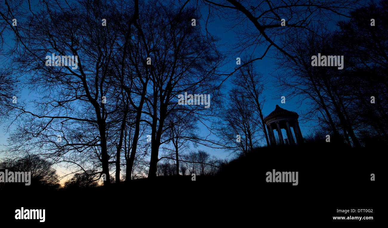 Munich, Germany. 23rd Feb, 2014. The sun sets on the horizon next to ...