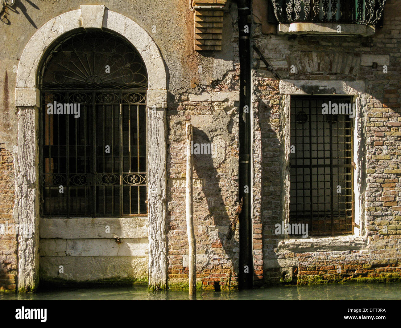 Architectonical detail of an old door and window. Venice. Veneto. Italy ...