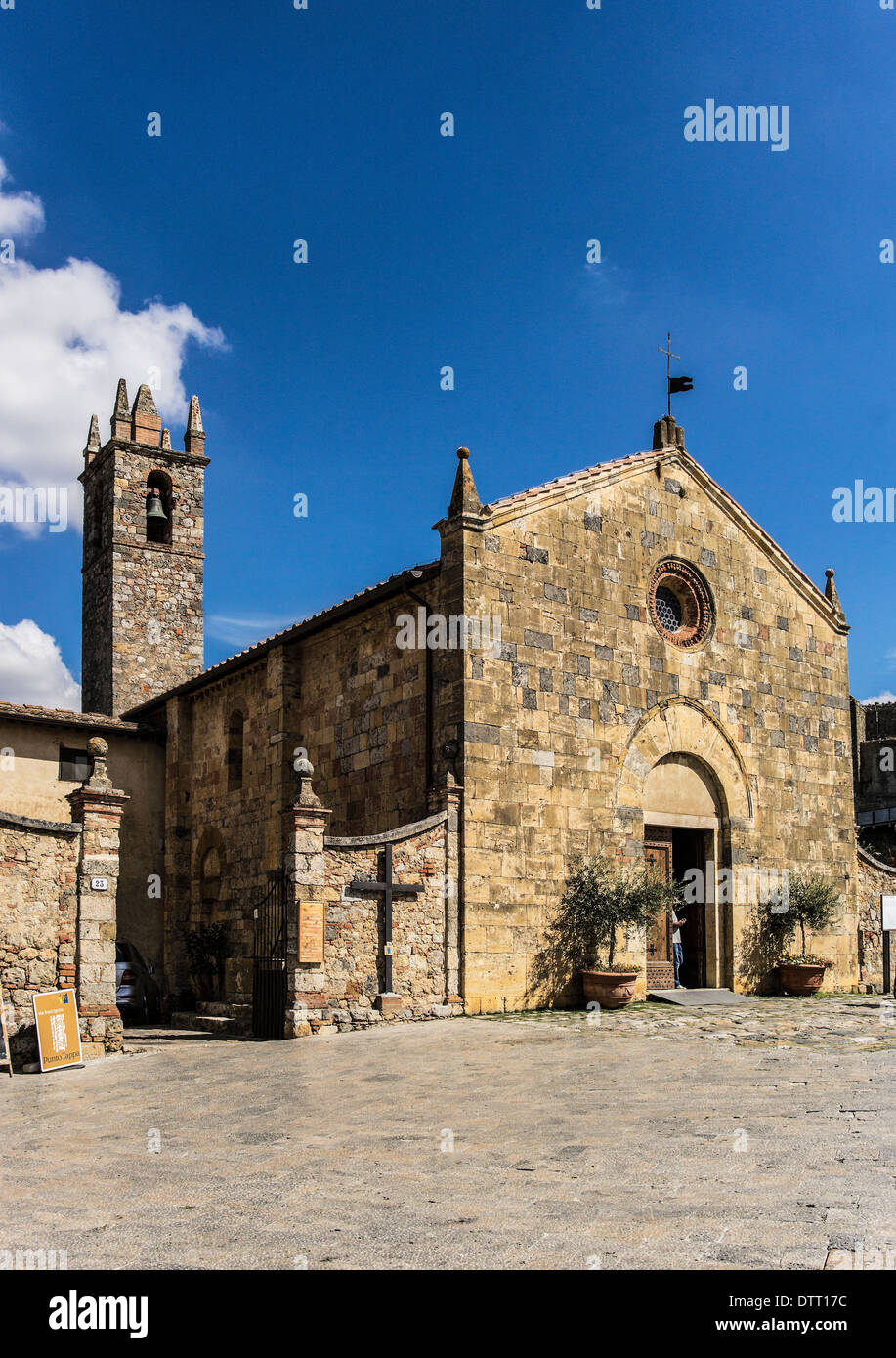 The 13th century church of the medieval walled village of Monteriggioni ...