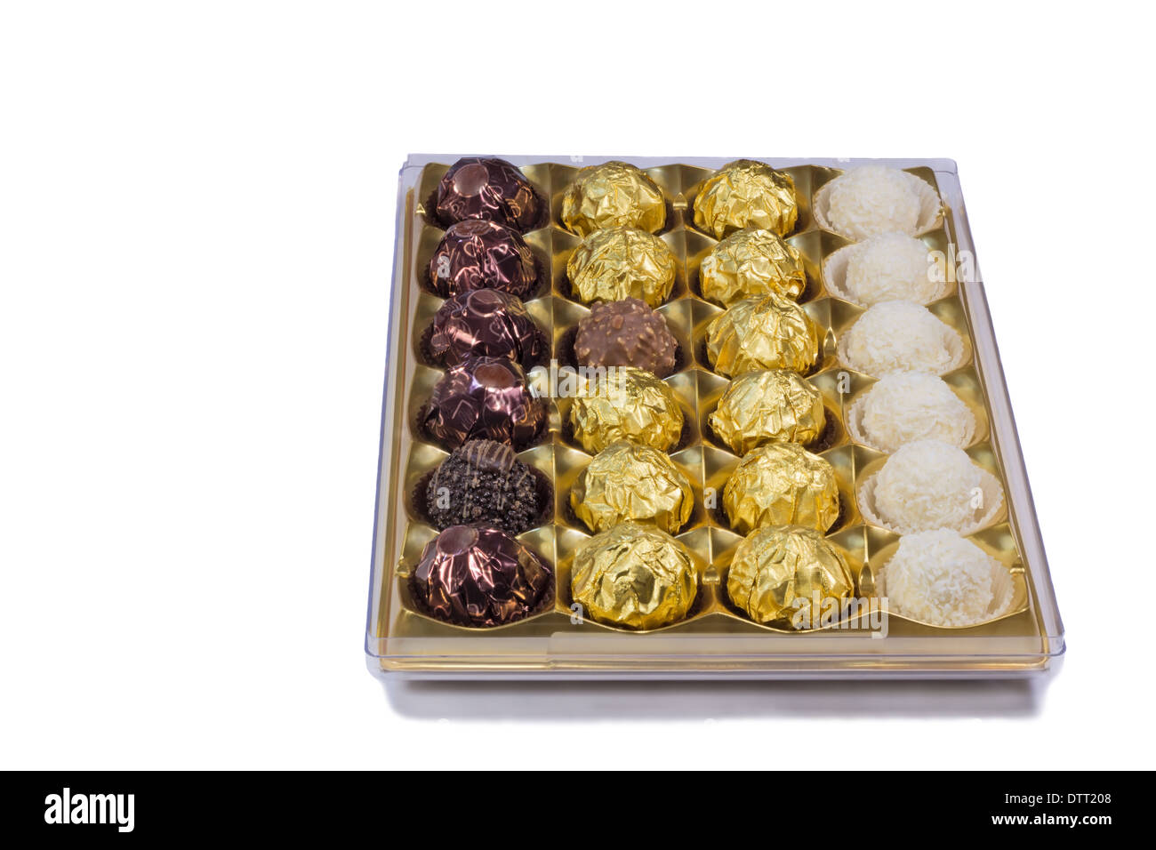 A variety of chocolates in a box. Presented on a white background Stock ...