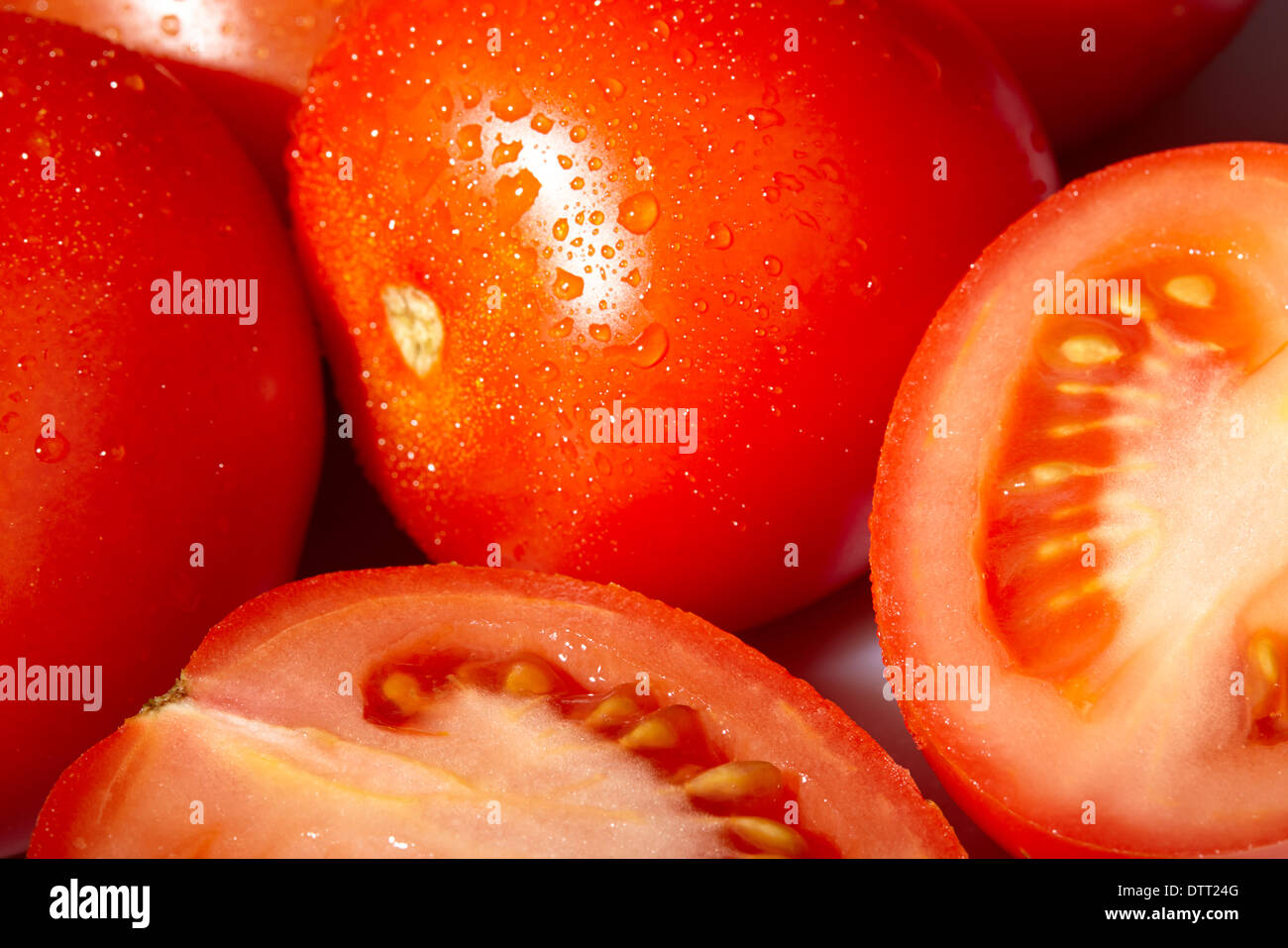 Fresh red tomatoes with water drops Stock Photo - Alamy