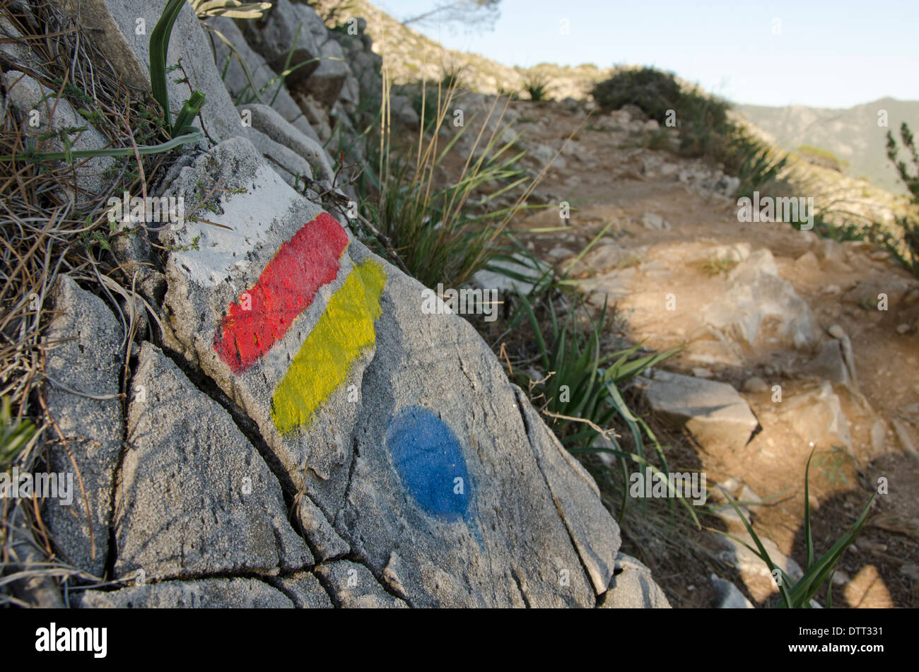 Hiking trail with marked signs painted on rock in Mijas, Spain Stock ...
