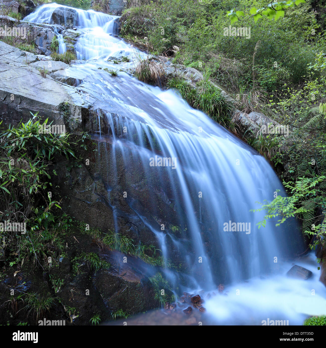 waterfall on the rock Stock Photo - Alamy