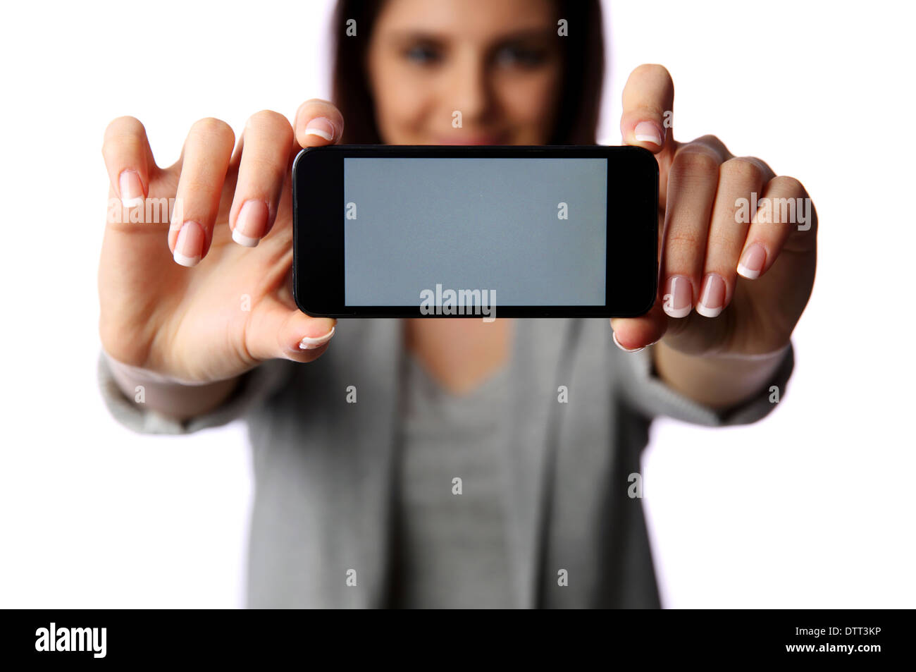 Woman showing smartphone screen isolated on white background Stock ...