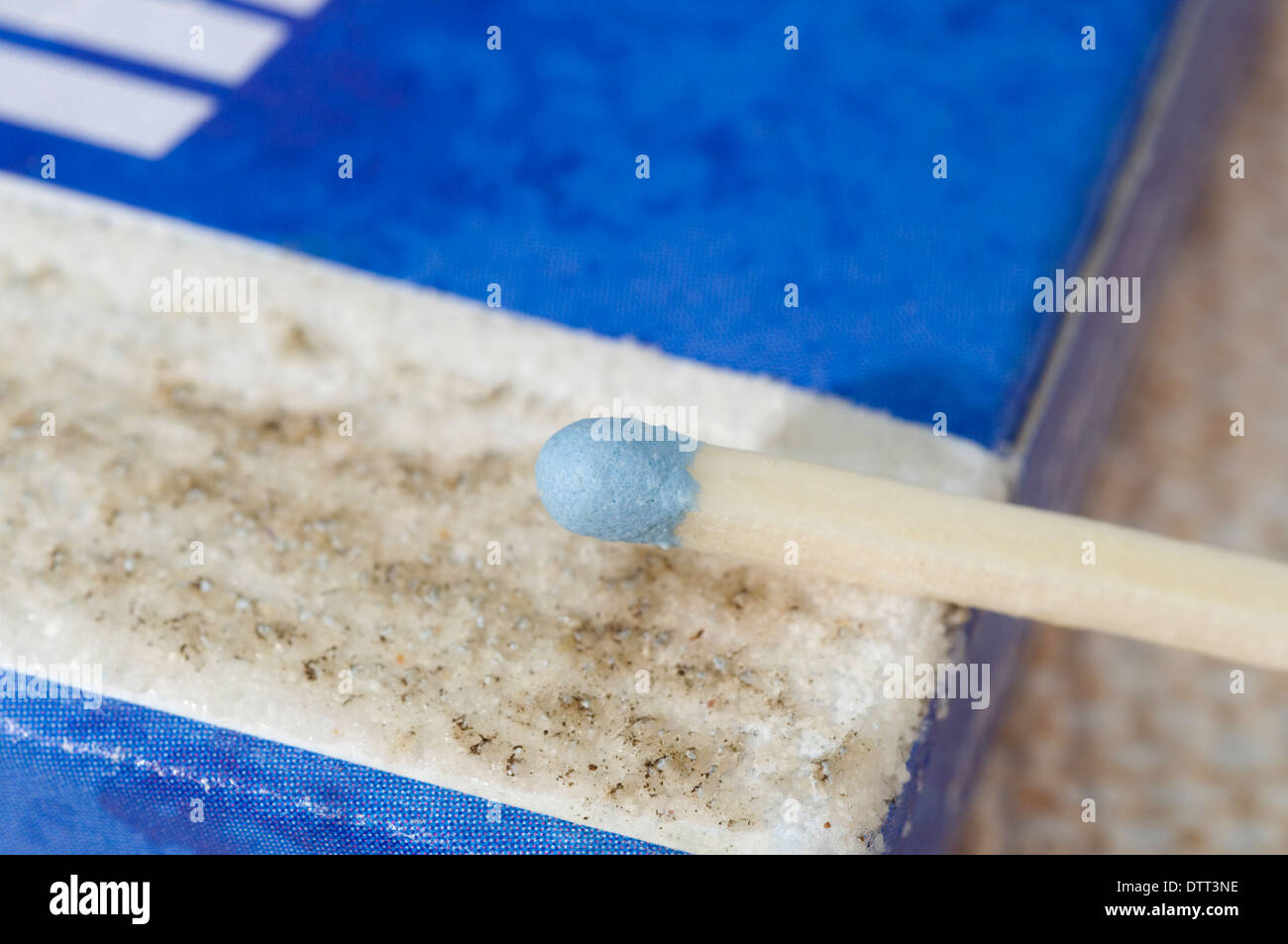 Match on striking surface of matchbox Stock Photo - Alamy