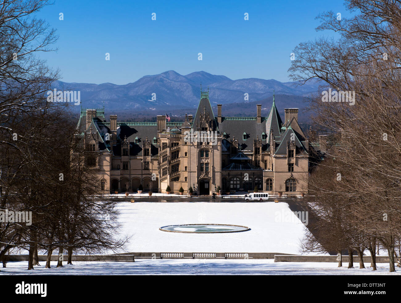 The Biltmore Mansion, front View, with mountains in background and snow ...