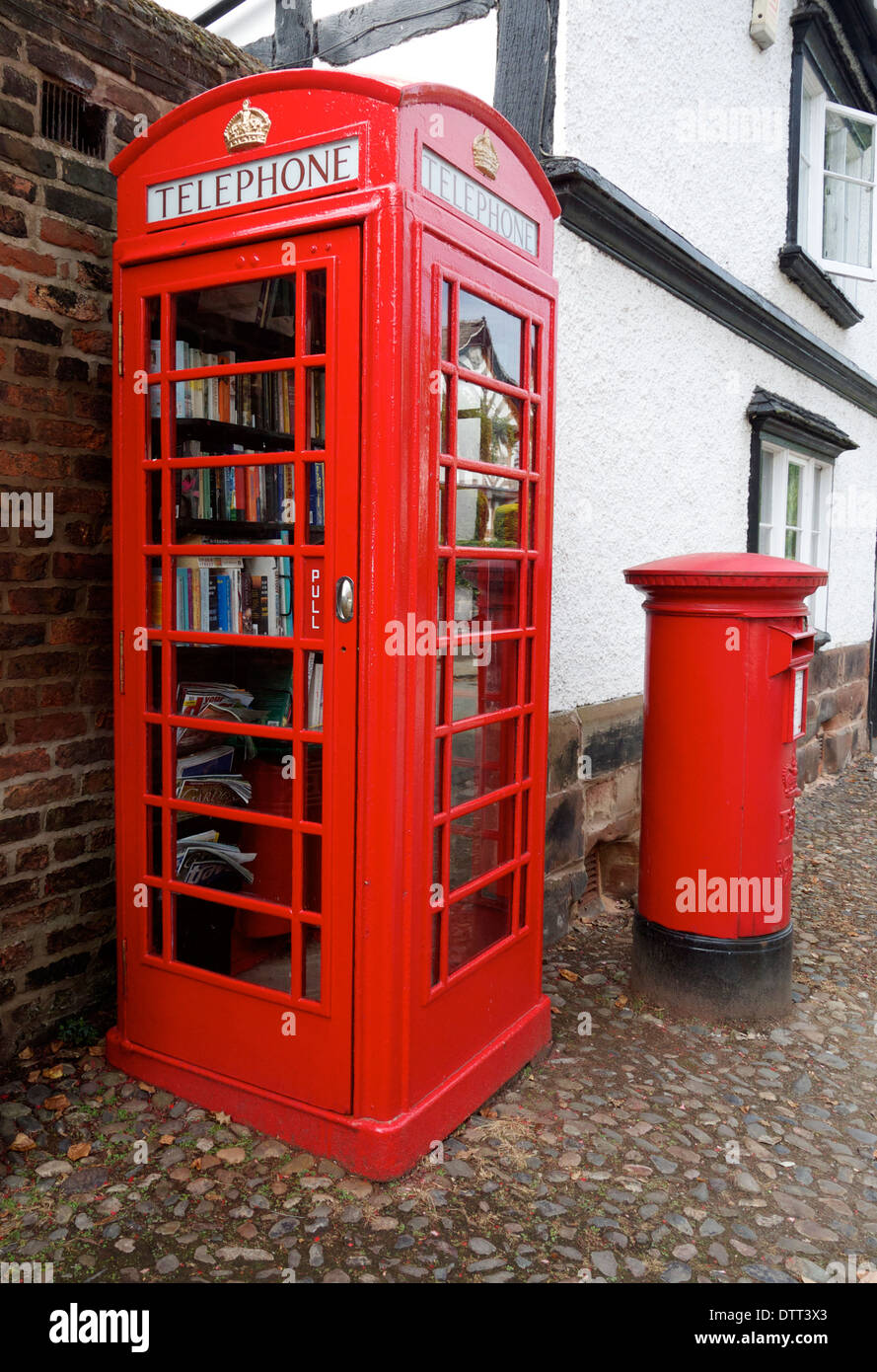 Old Red telephone box being used as a public library Stock Photo - Alamy