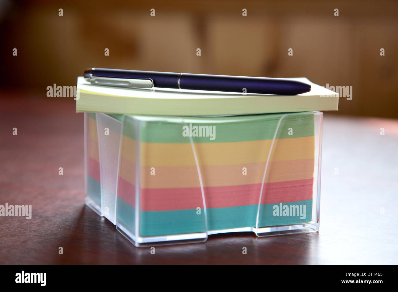 Pile of sticky note and pen Stock Photo - Alamy