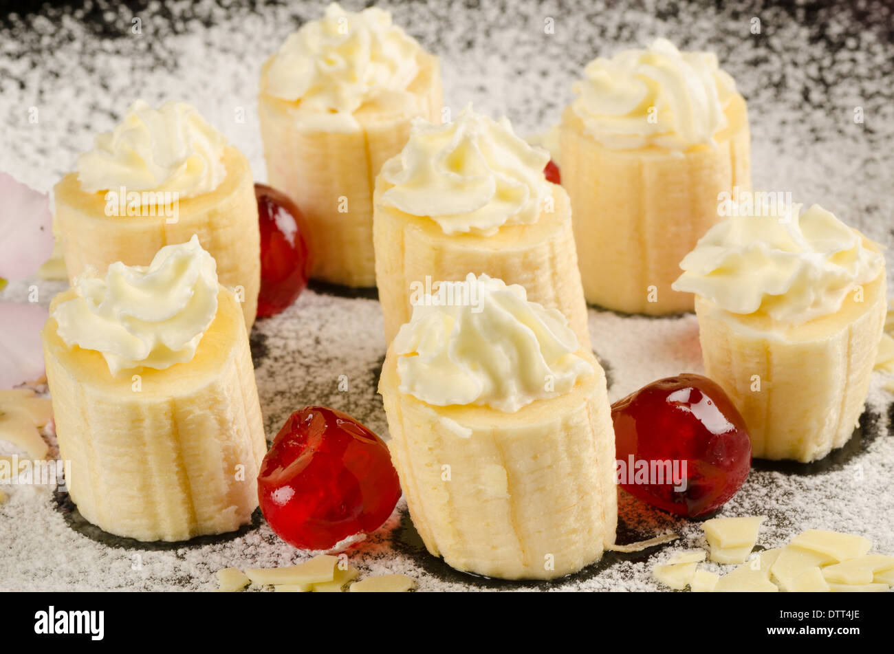 Fruity kid dessert with bananas and morello cherries Stock Photo - Alamy