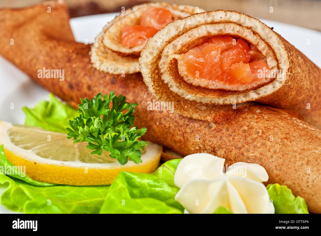 Pancake red fish white sauce hi-res stock photography and images - Alamy