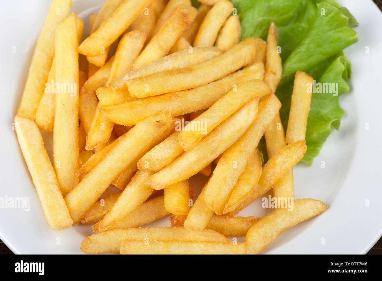 Golden potatoes fries Stock Photo - Alamy