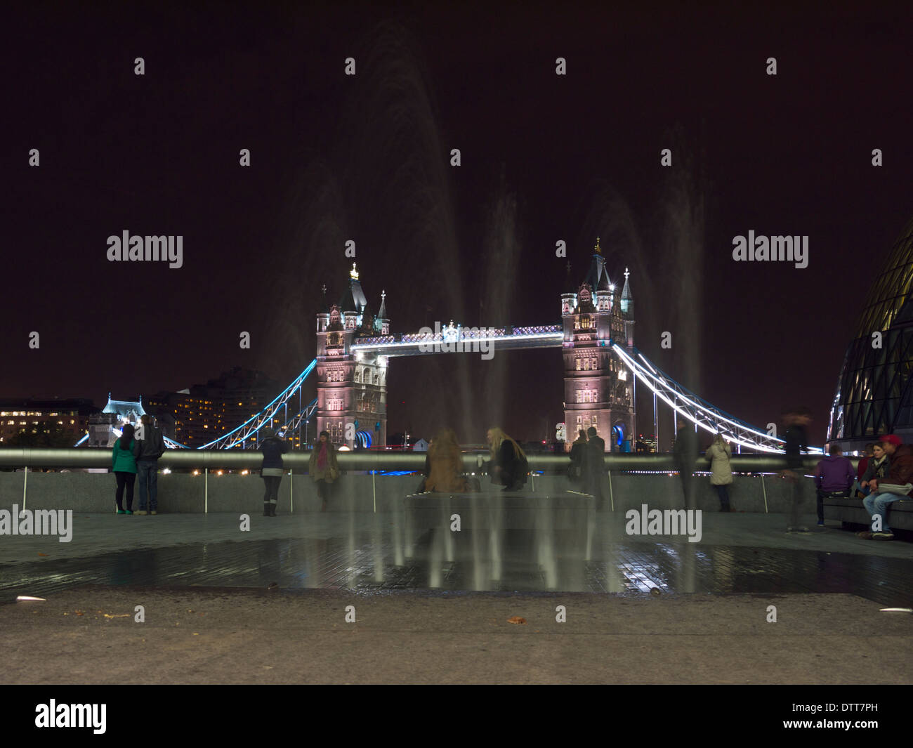 People viewing Tower bridge in London in front of some fountains Stock ...