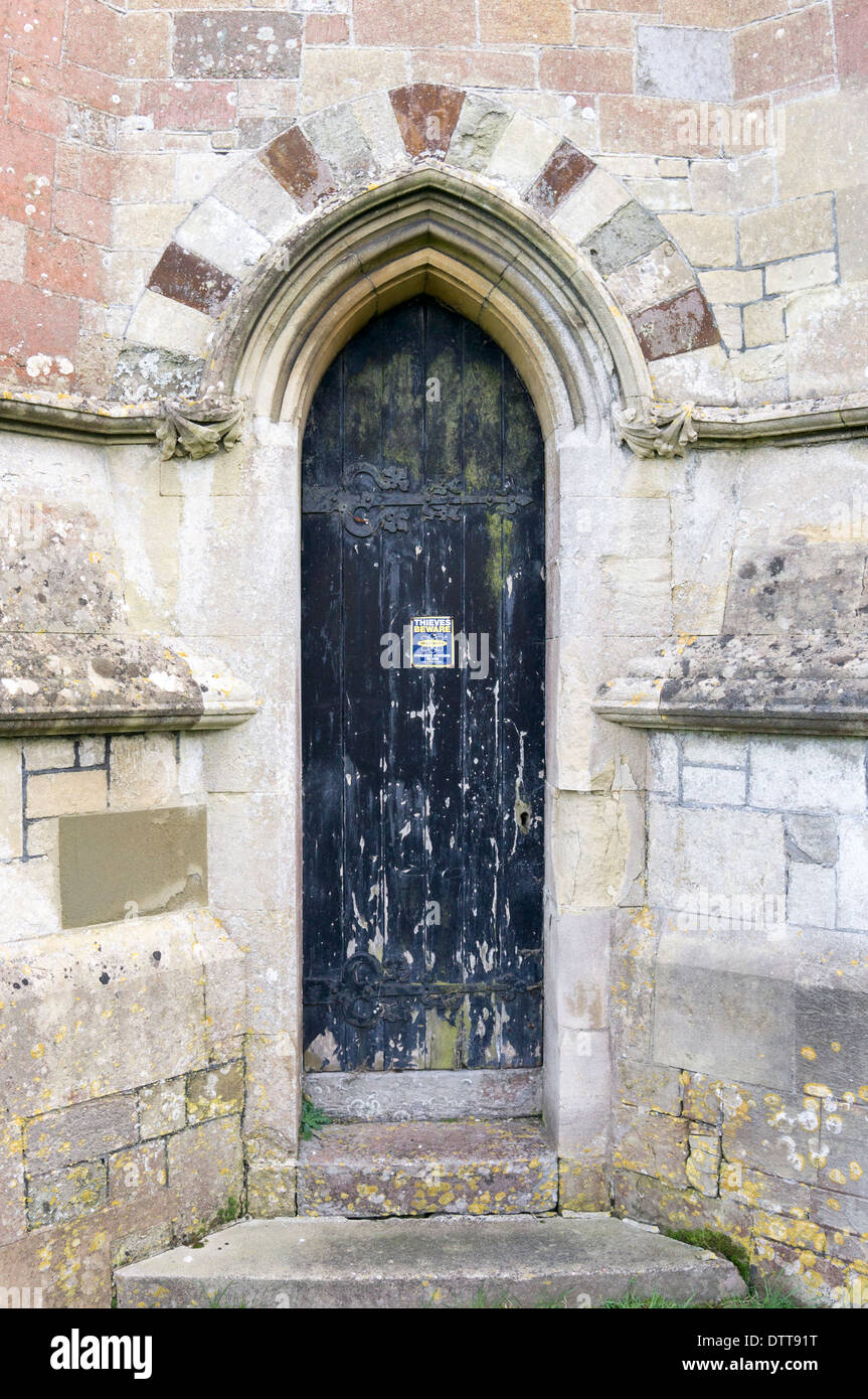 Very small and narrow church door UK Stock Photo - Alamy