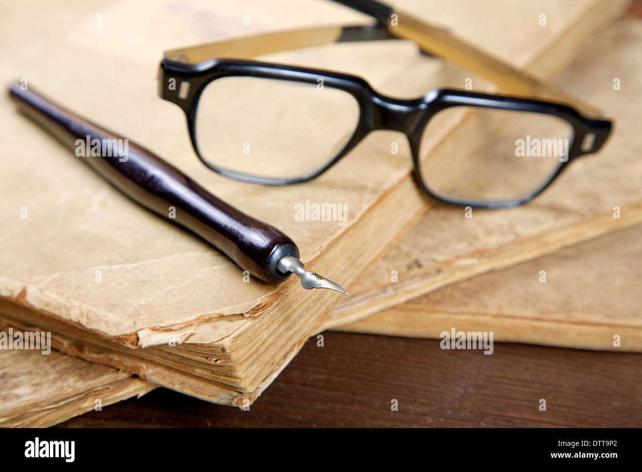Still-life with old writing-books a nib Stock Photo - Alamy