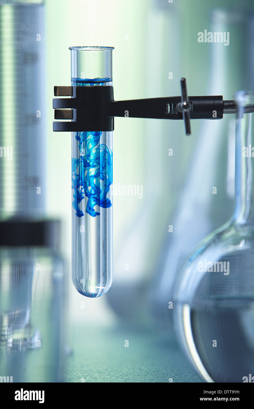 Swirling liquid in test tube in lab Stock Photo - Alamy