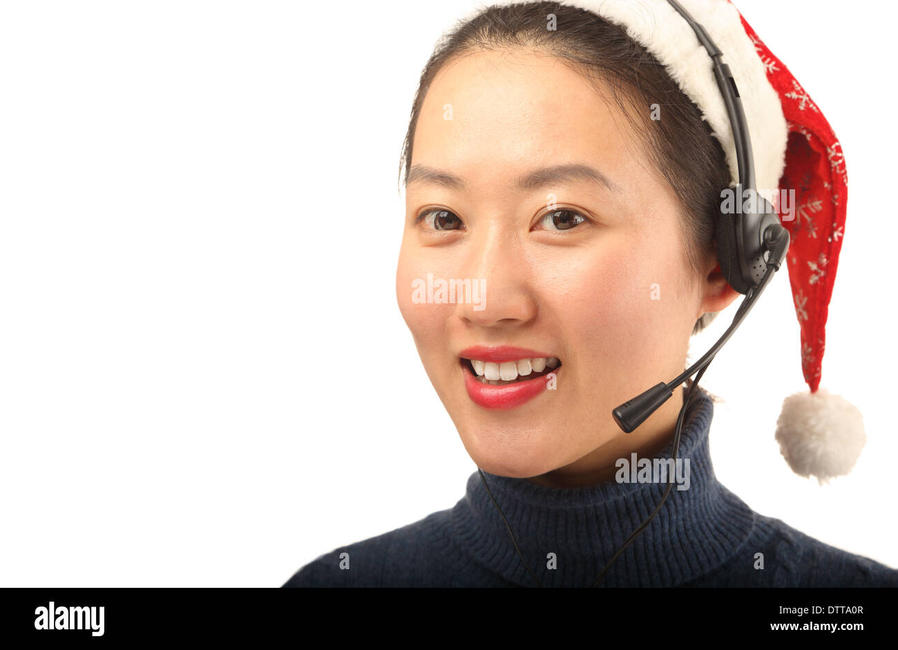 Female customer representative with Christmas hat on white background ...