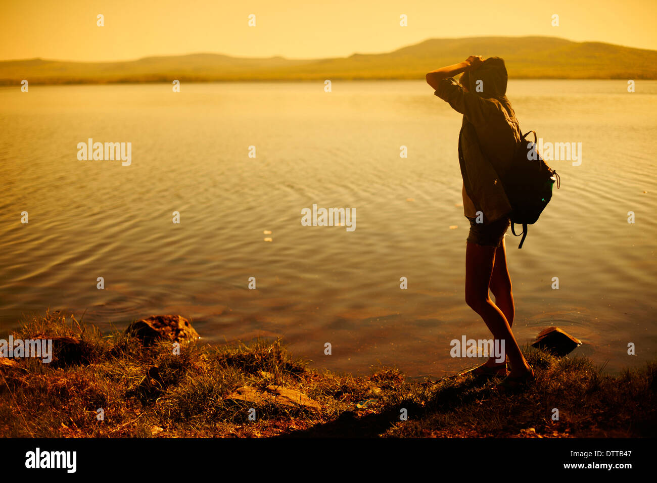 Silhouette woman backpack standing on hi-res stock photography and ...