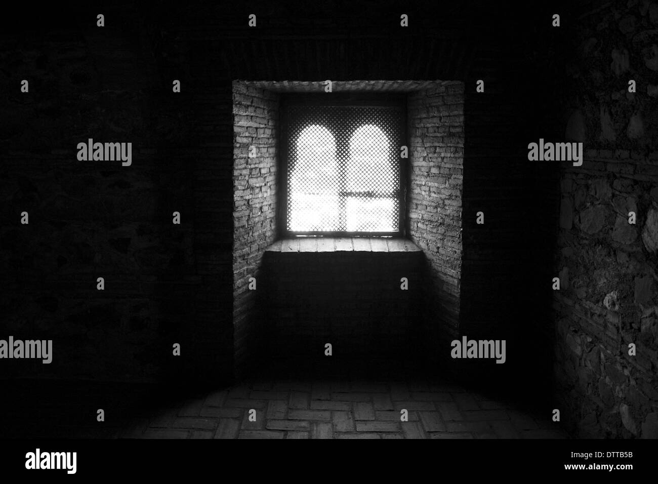 Arab window from inside the keep of an andalusian castle Stock Photo ...