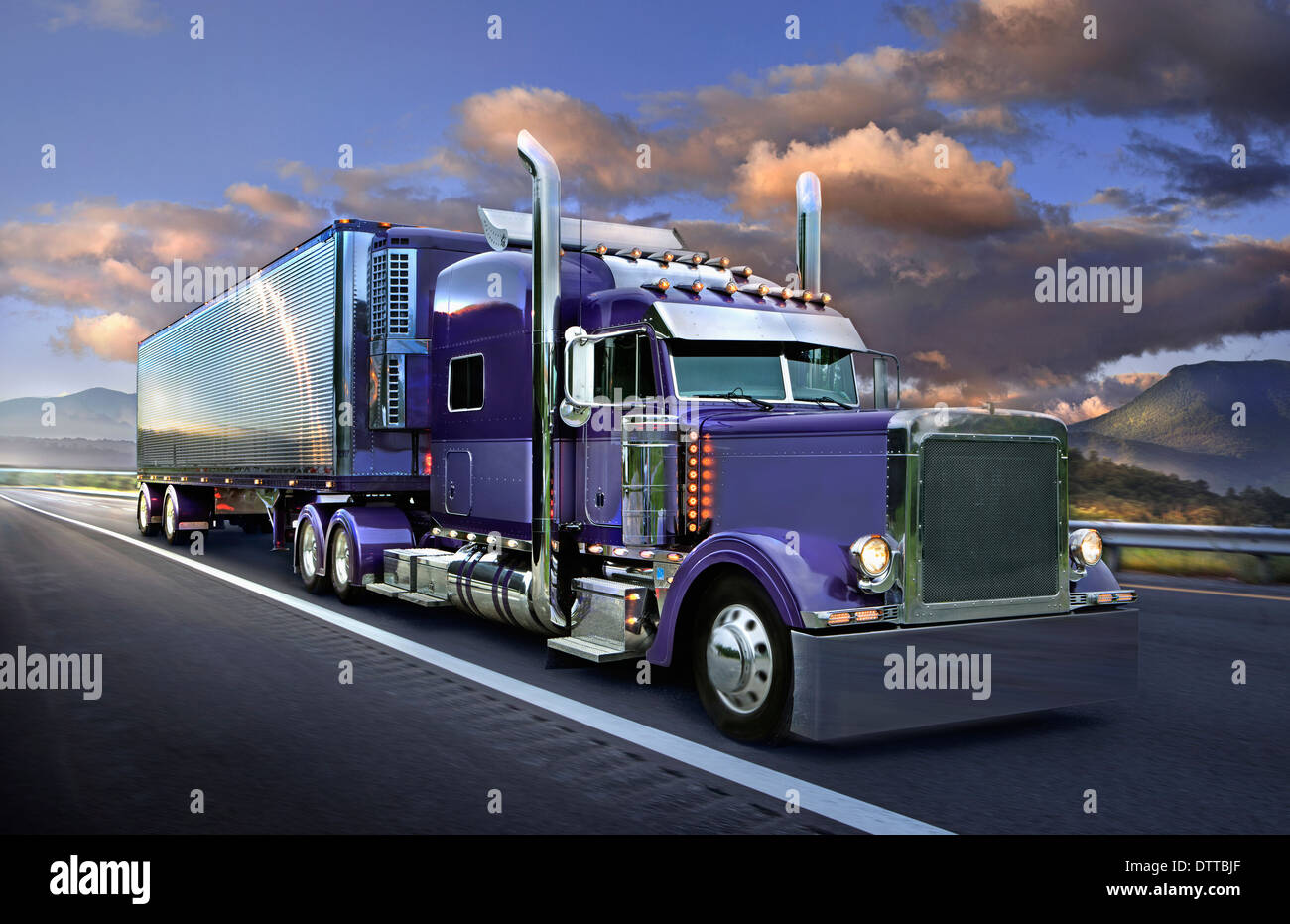 Semi truck driving on freeway Stock Photo - Alamy